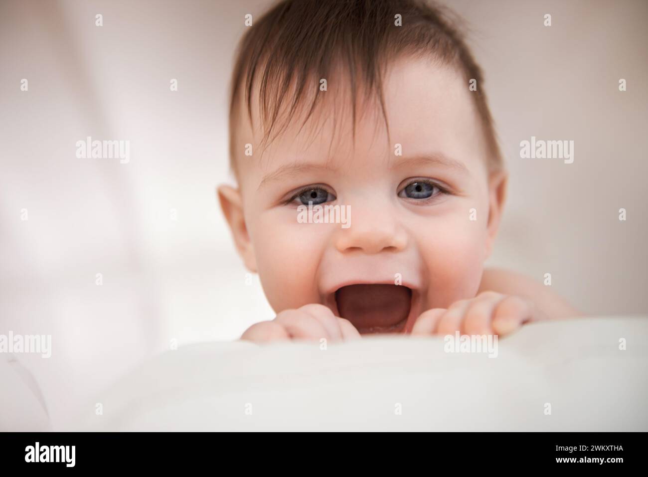 Baby boy, excited smile and happy for play, growth and development for ...
