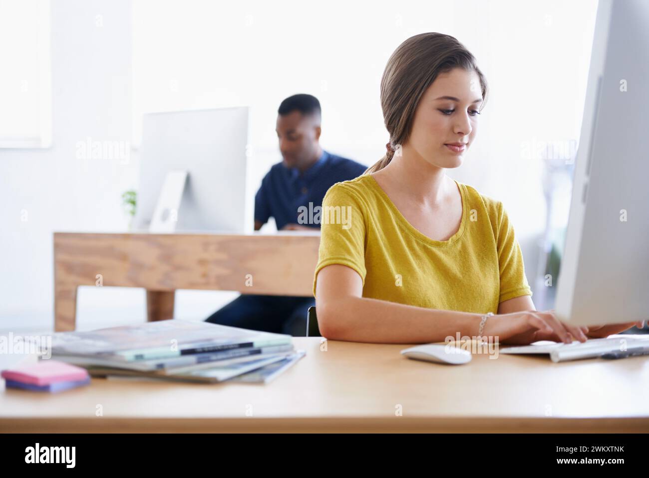 Confident woman, intern and office with online computer, workspace and ...