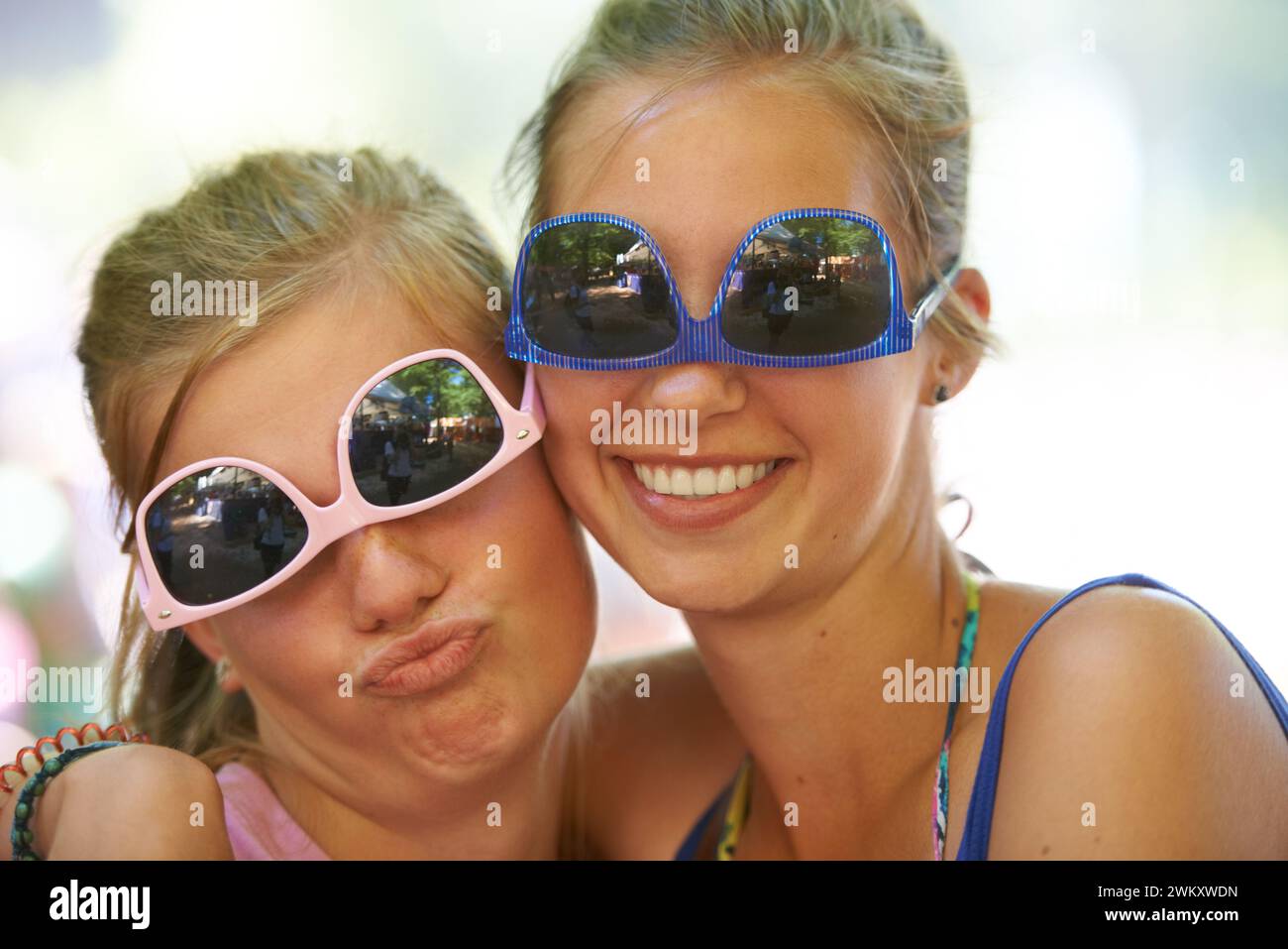 Women, sunglasses and silly portrait at festival in nature, excited and ...