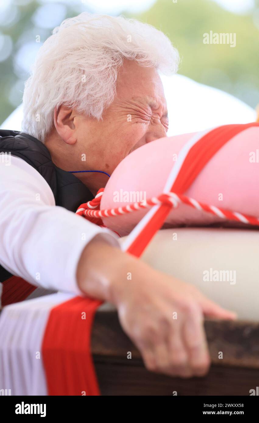 A participant in the men's section attempts to lift a huge, 150kg ...