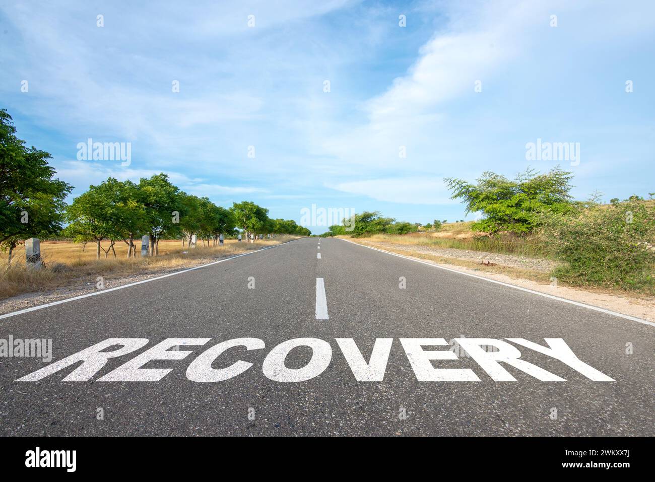 'Recovery' text on the asphalt road. Business recovery concept Stock ...