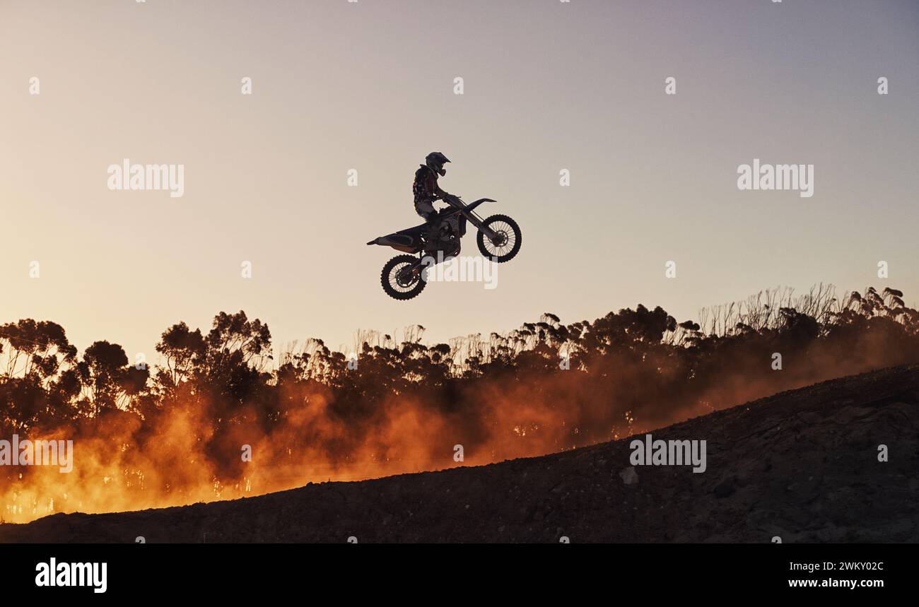 Person, jump and professional motorcyclist in the air on mockup for ...