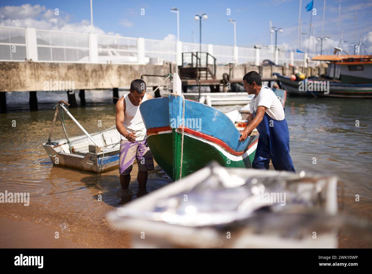 Lake, boat and fishermen by water for fishing industry in sea by ...