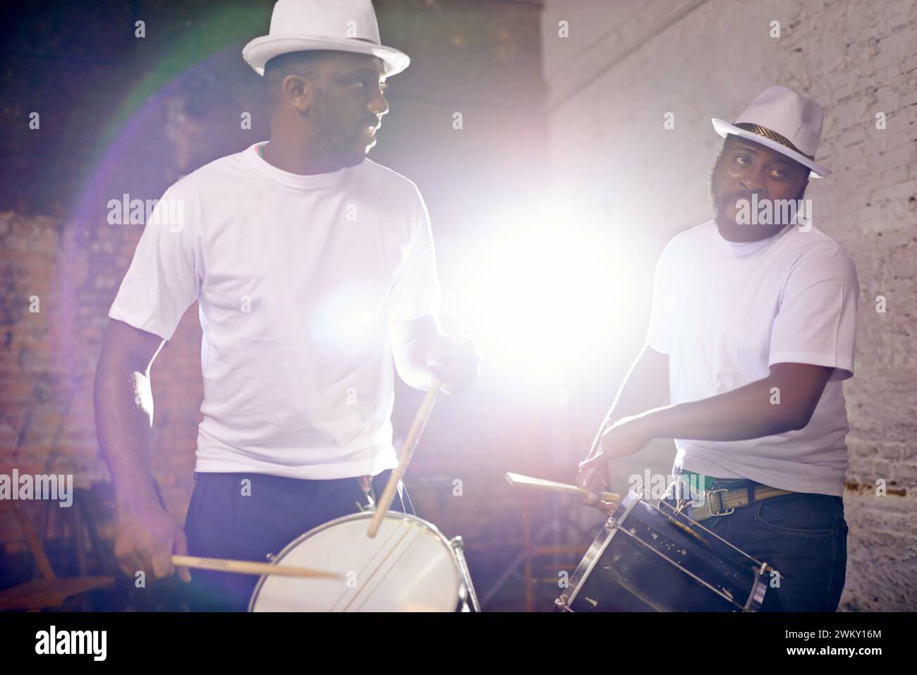Night, drum or men in band for carnival playing an instrument in ...