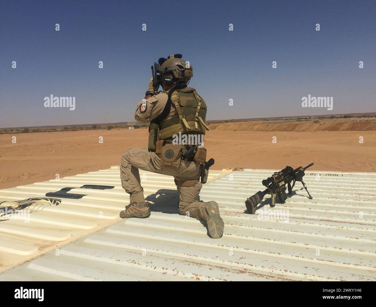 Soldier in military uniform stands hi-res stock photography and images ...