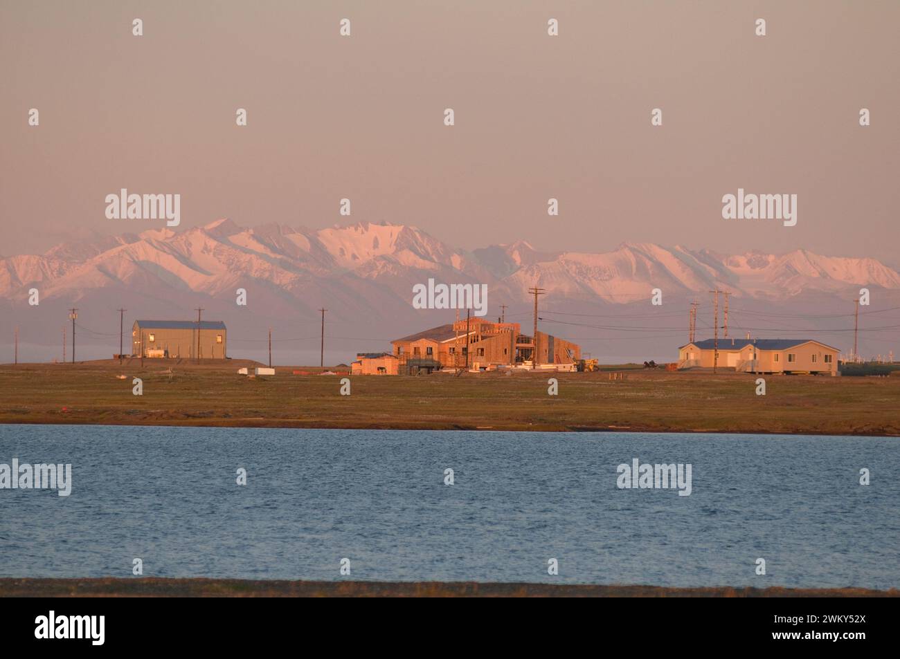 Inupiaq village Kaktovik population population 300 glowing at sunrise ...