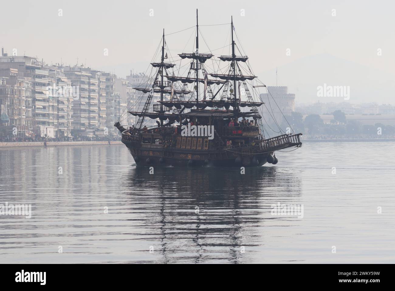 Mystical voyage. Pirate ship adventure around White Tower. Aegean sea ...