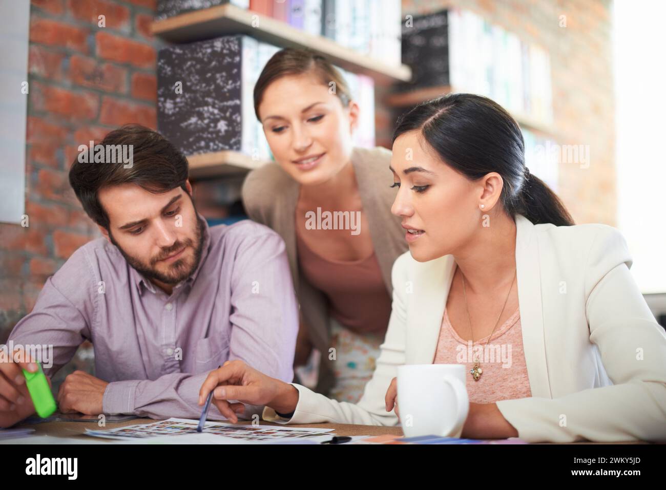 Team, paperwork and business people in discussion, planning or ...