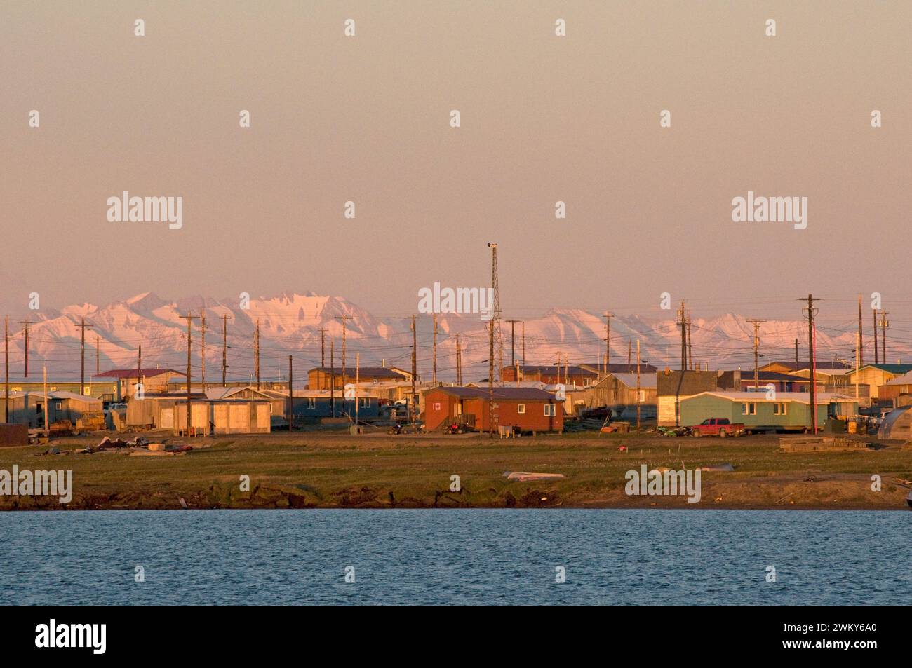 Inupiaq village Kaktovik population population 300 glowing at sunrise ...