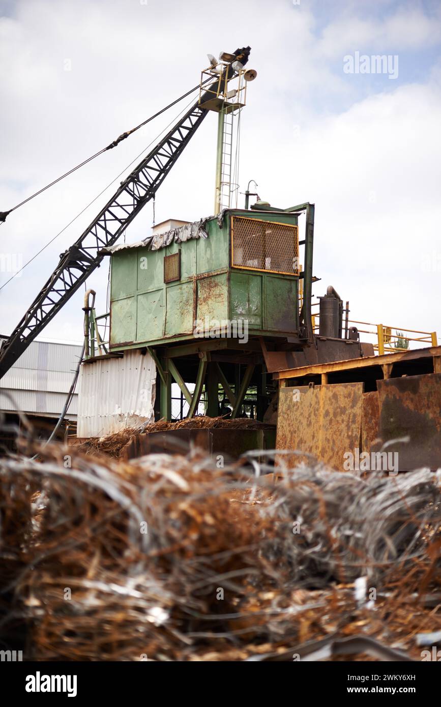 Crane, machine and scrapyard for moving metal with sustainability ...