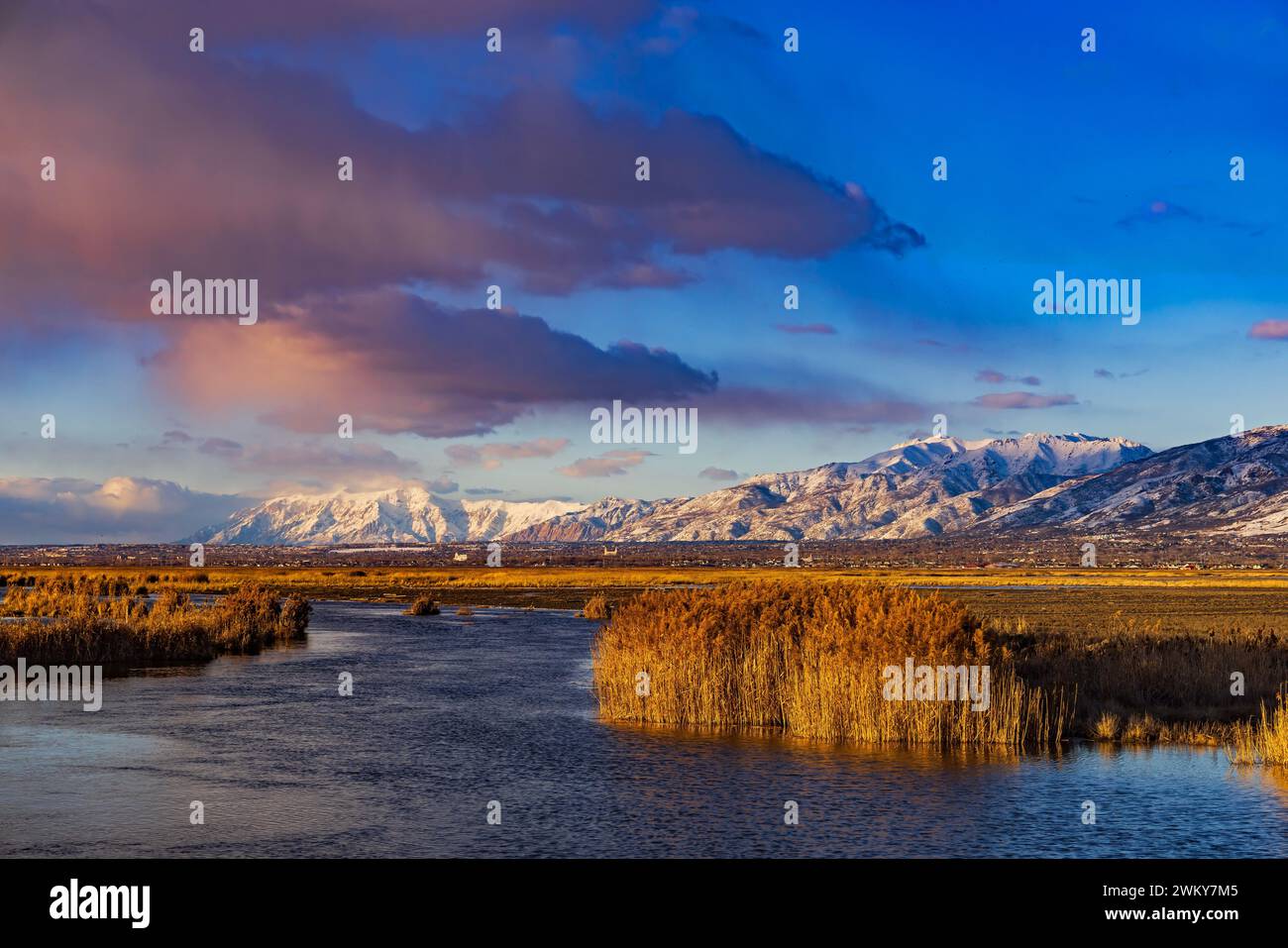The late-afternoon sun lights up the clouds and landscape at Farmington ...