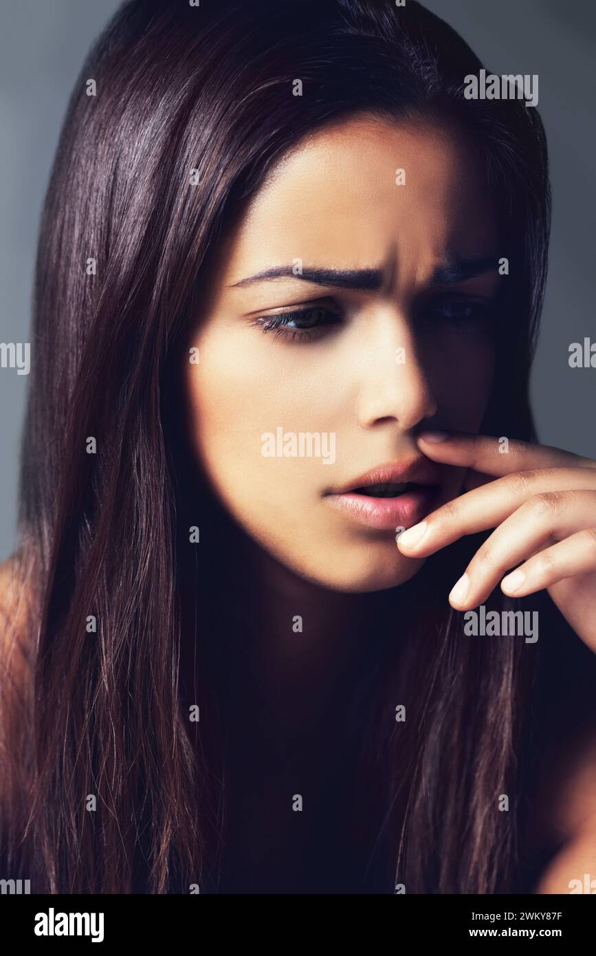 Woman, hair and confused for beauty, cosmetology and microblading with ...