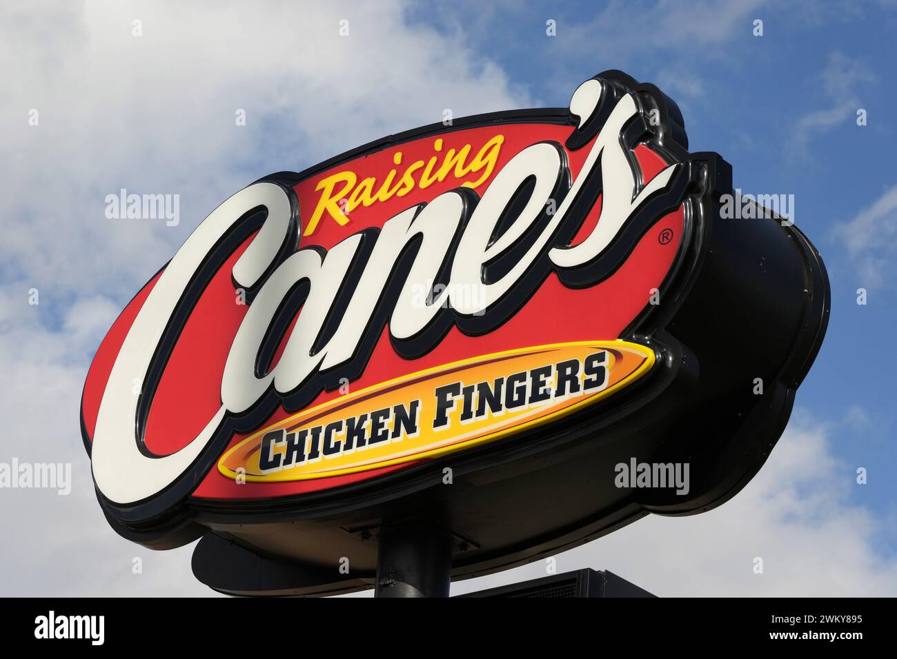A Raising Cane's chicken fingers fast food restaurant sign, Thursday ...