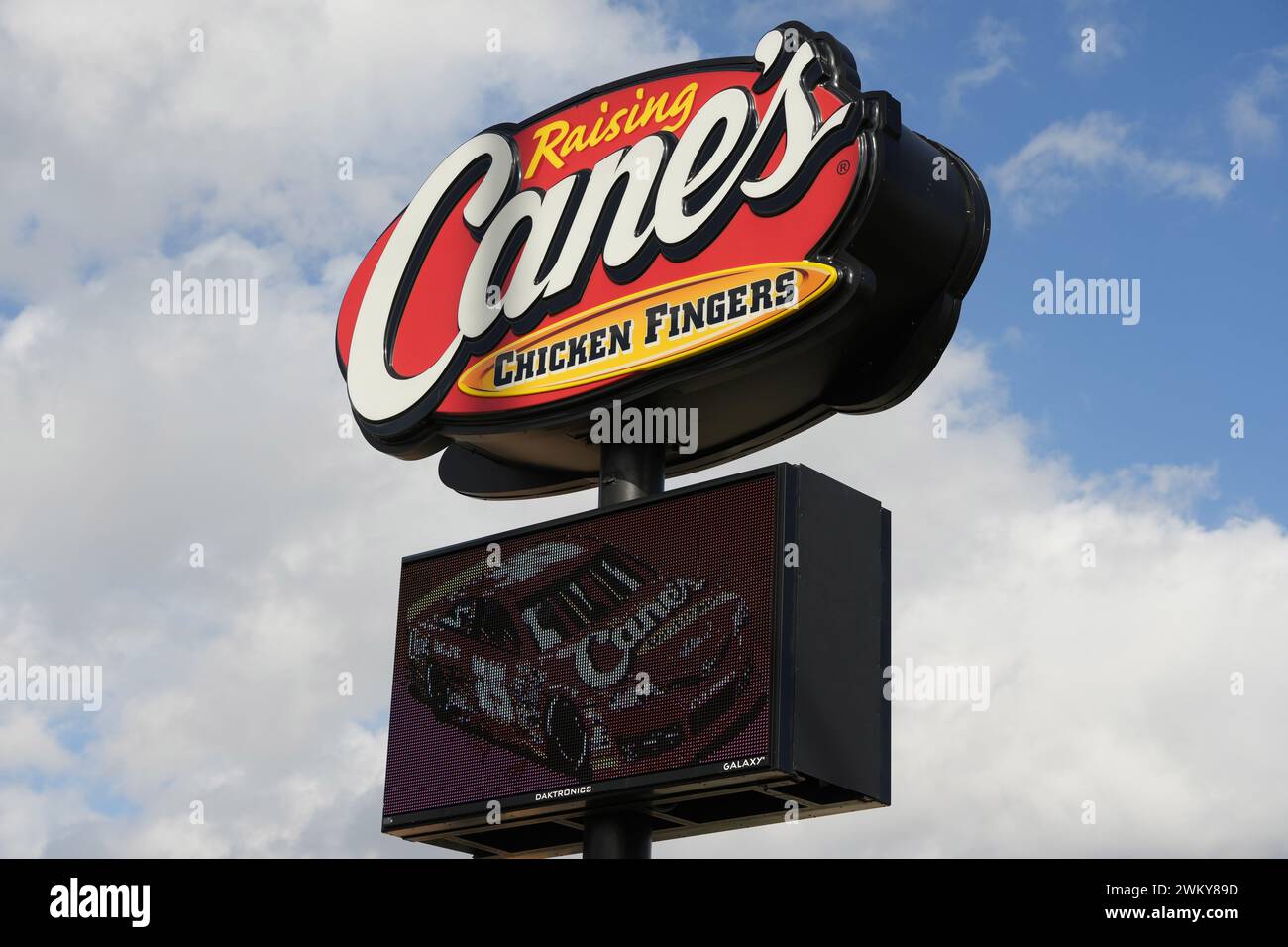 A Raising Cane's chicken fingers fast food restaurant sign, Thursday ...
