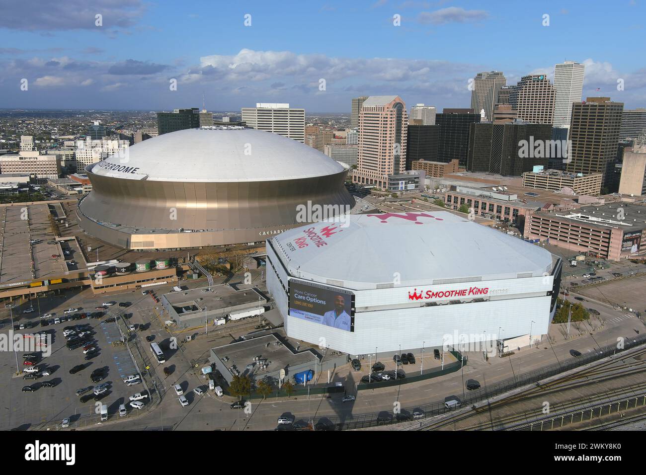 A general overall aerial view of the Caesars Superdome (left) and ...