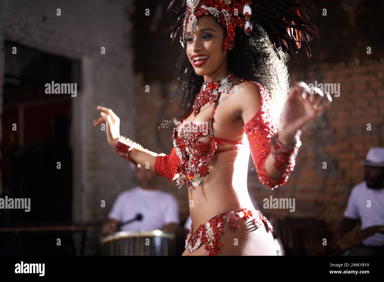 Happy woman, samba dancer and festival with band for performance at carnival or concert. Face of ...