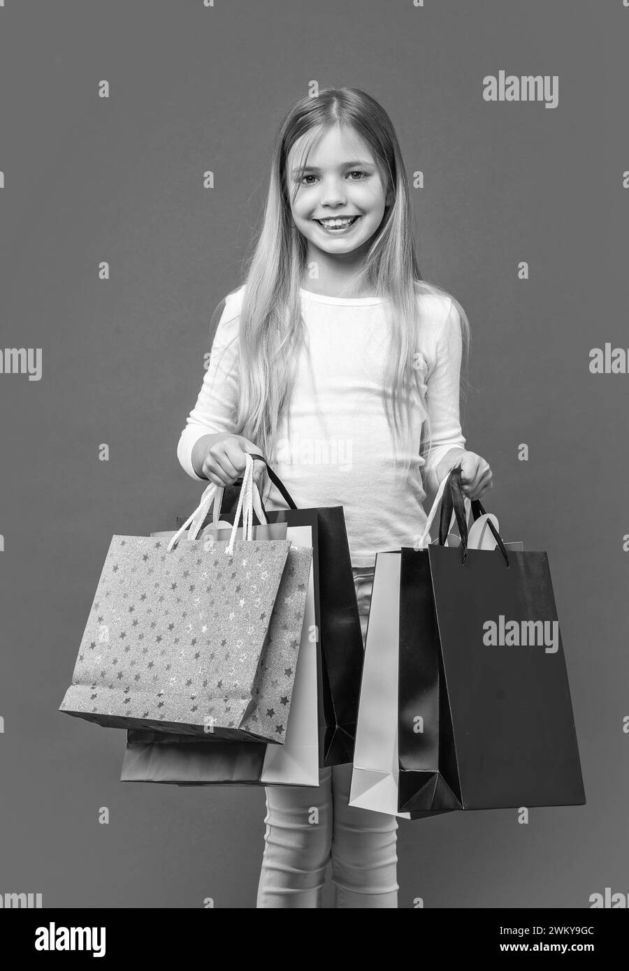 photo of positive teen girl with shopping purchase. teen girl with ...