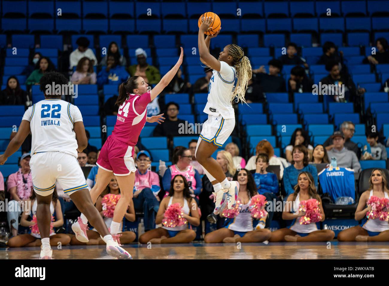 UCLA Bruins guard Charisma Osborne (20) shoots over Utah Utes guard ...