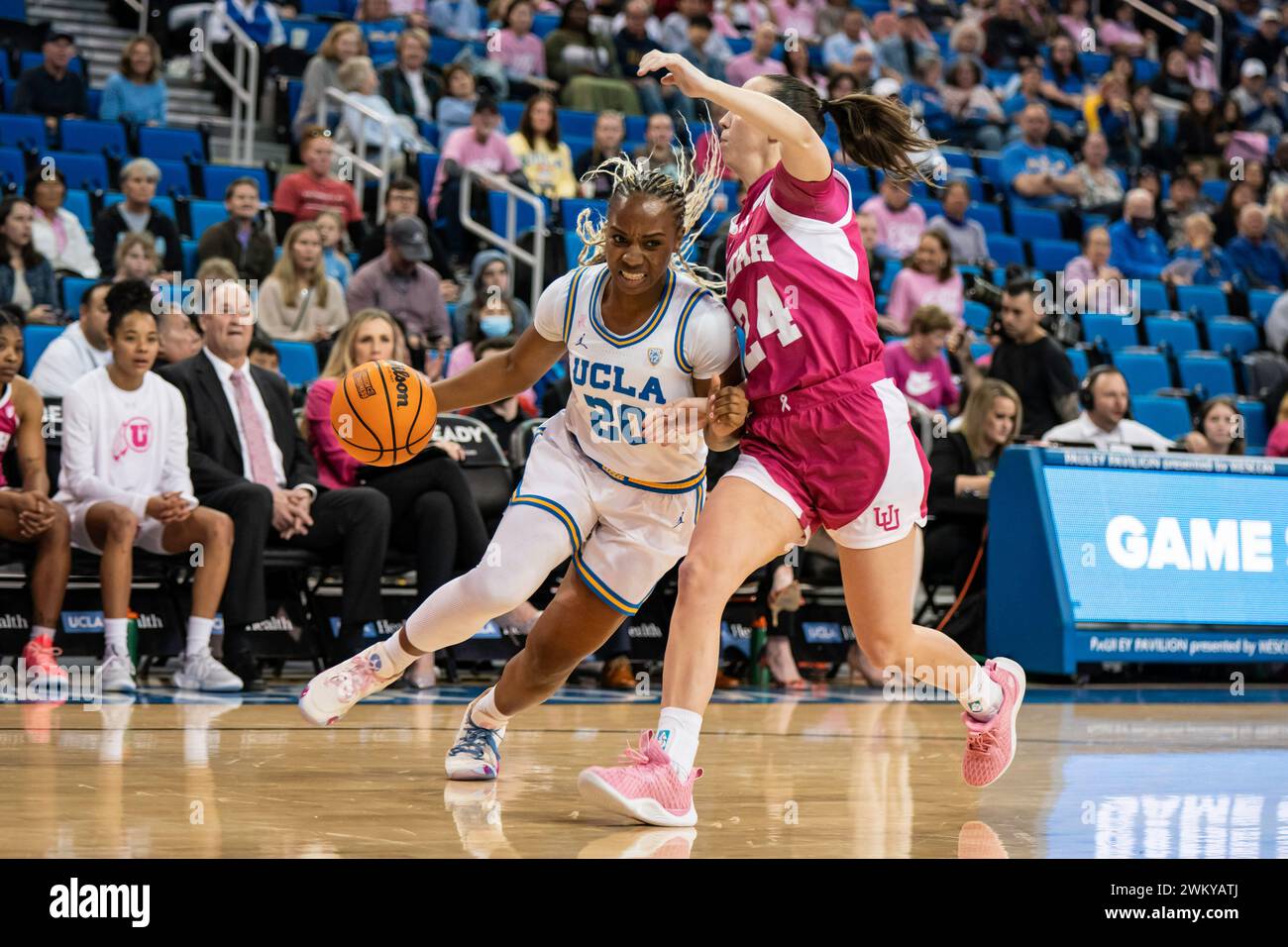 UCLA Bruins guard Charisma Osborne (20) drives against Utah Utes guard ...