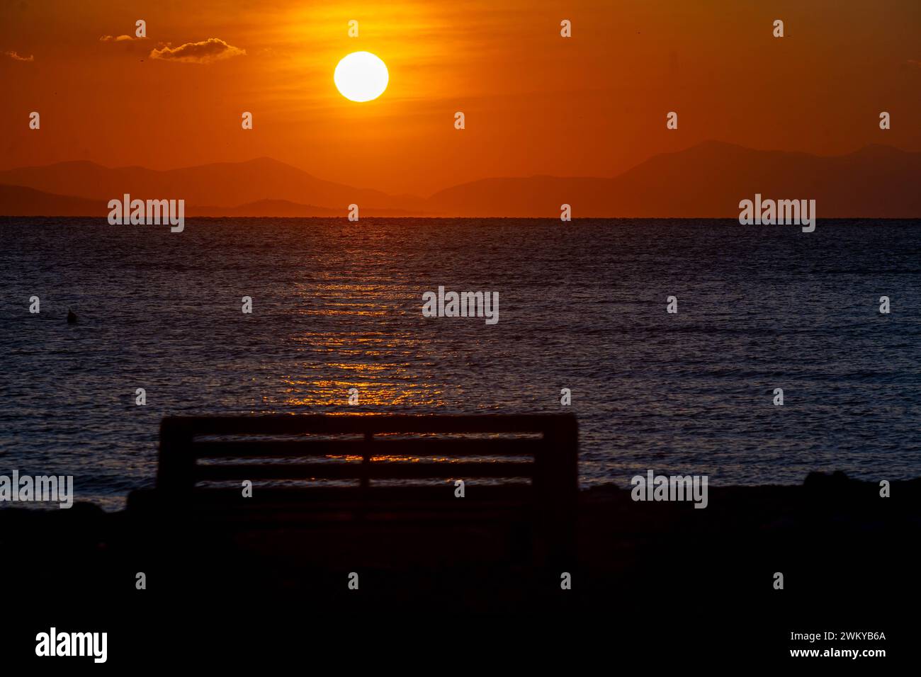 Woman sun bench beach hi-res stock photography and images - Alamy
