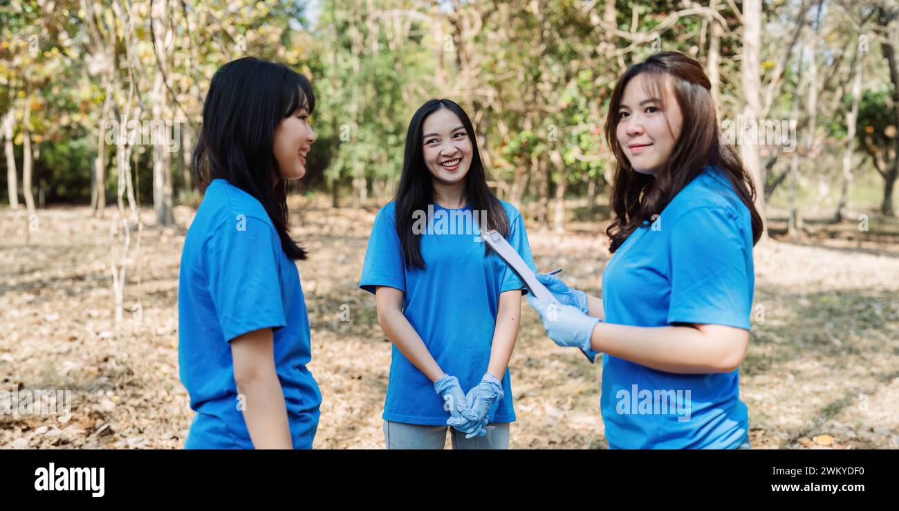 Group of volunteers, community members cleaning the nature from garbage ...