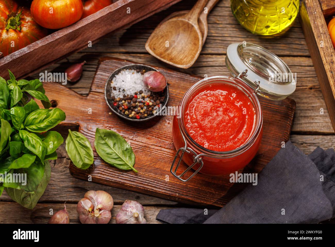 Rich homemade tomato sauce and ingredients Stock Photo - Alamy