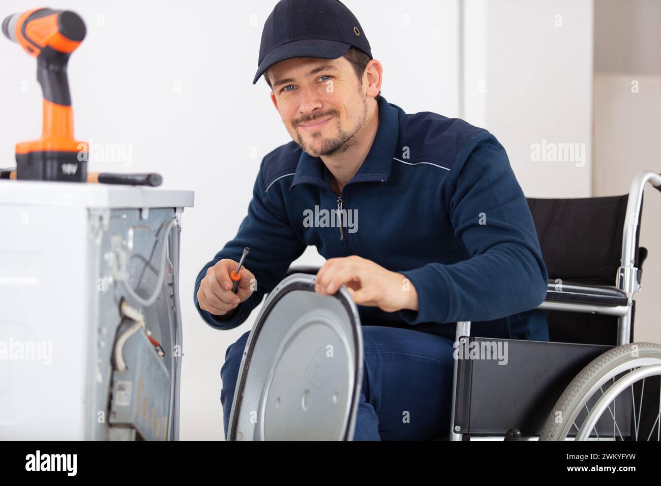 Handyman working electric grinder hi-res stock photography and images ...