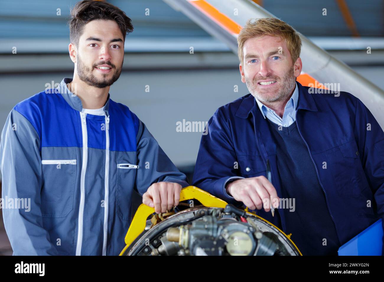 Smiling mechanics hi-res stock photography and images - Alamy