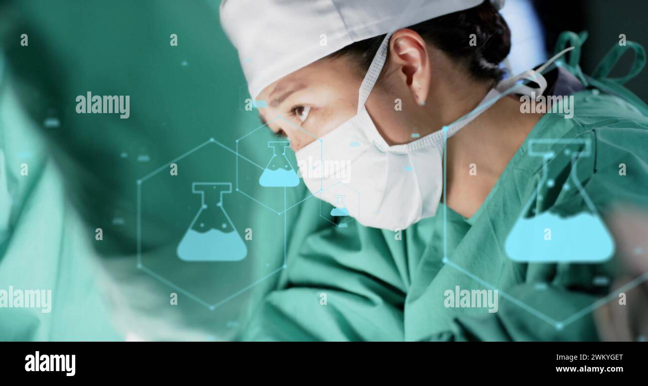 Diverse group surgeons operating hi-res stock photography and images ...