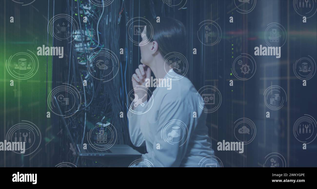 Image of falling icons over caucasian female server room worker Stock ...