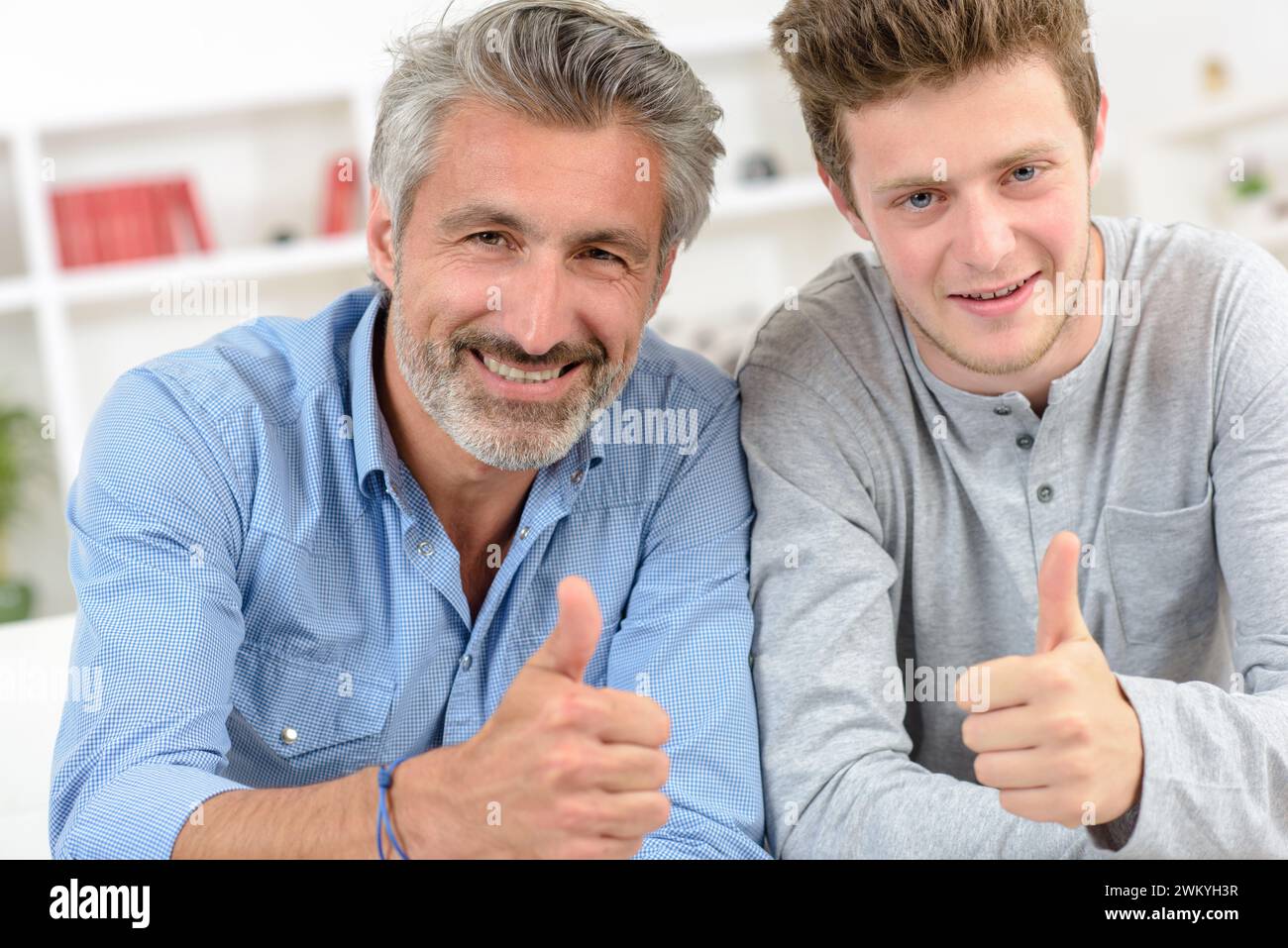 father and son showing a like Stock Photo - Alamy