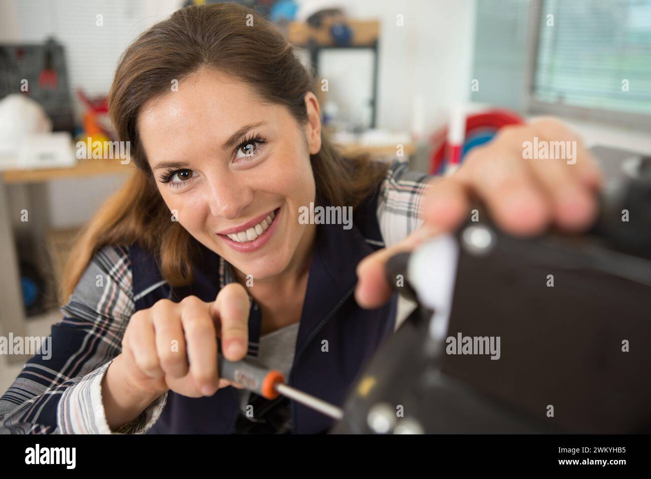 woman fixing a printer Stock Photo - Alamy