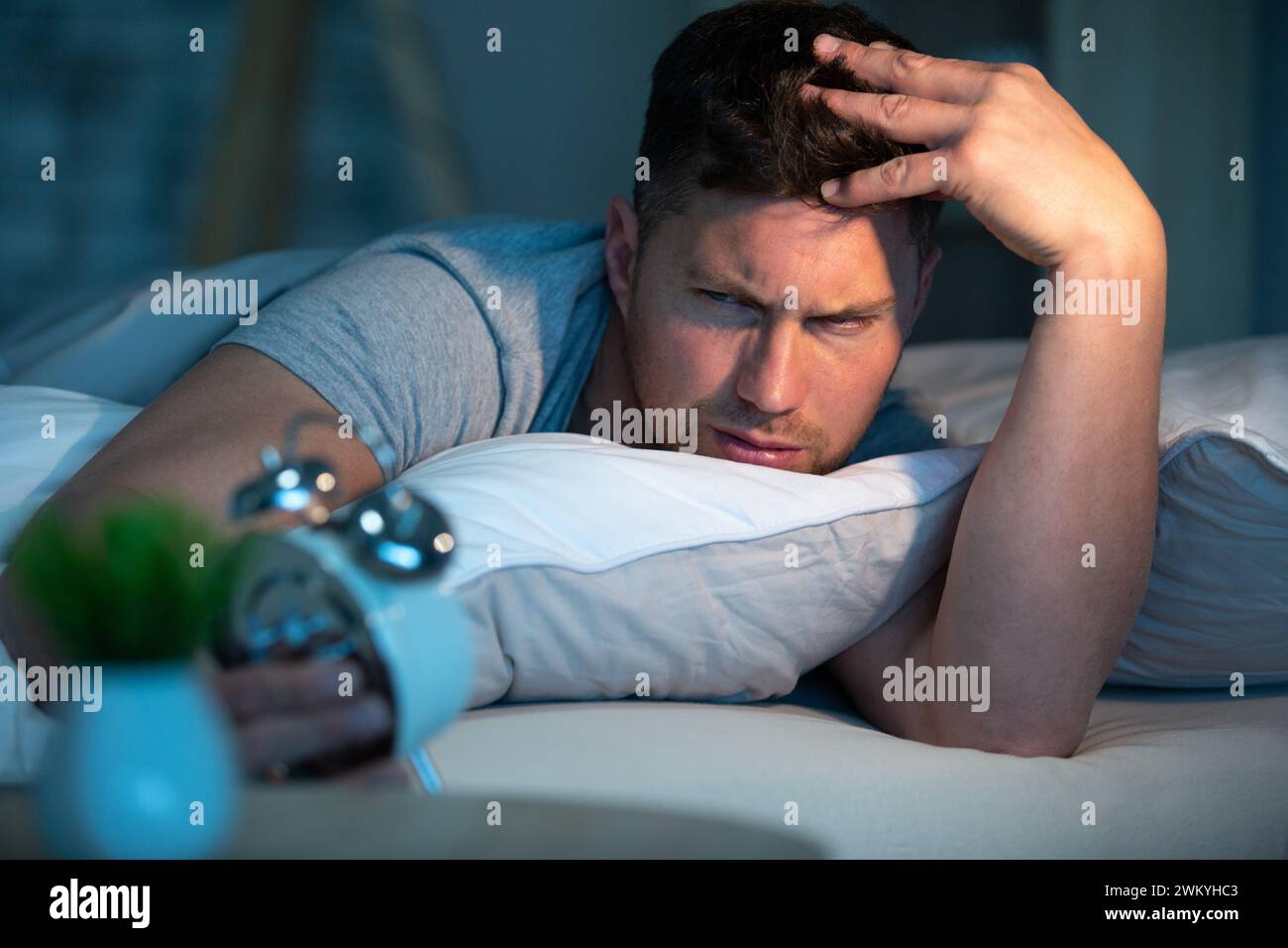a young man cannot fall asleep Stock Photo - Alamy