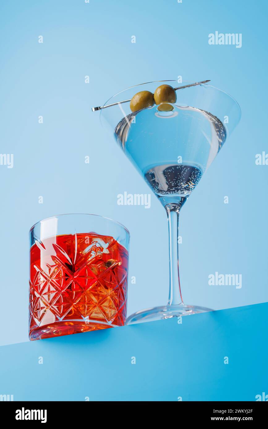Cocktail delight: Vibrant drinks against a cool blue background with ...