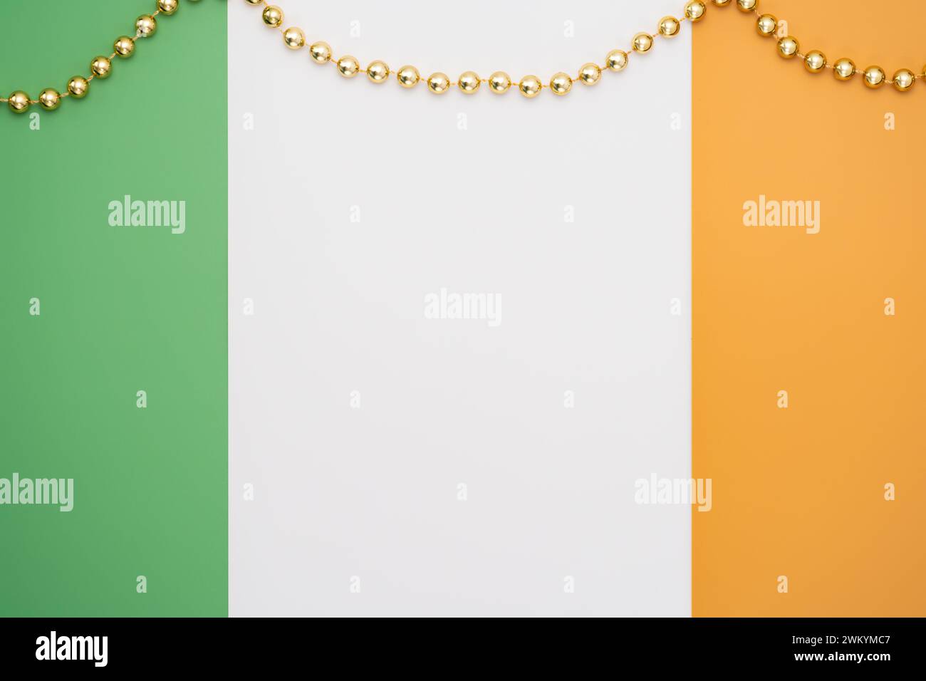 Irish flag made from color paper with golden beads. St Patrick's ...