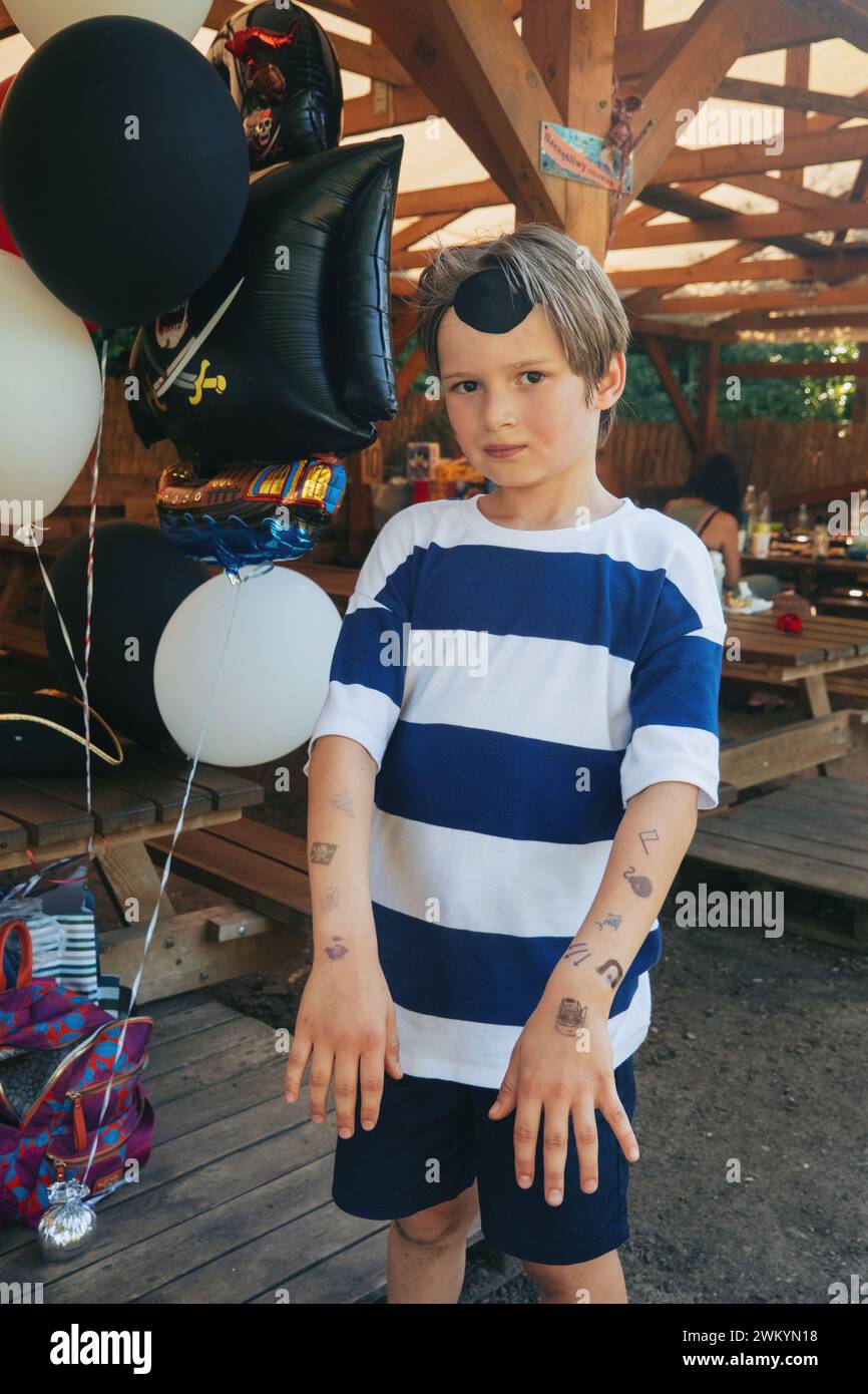 A child in a pirate costume, birthday Stock Photo - Alamy