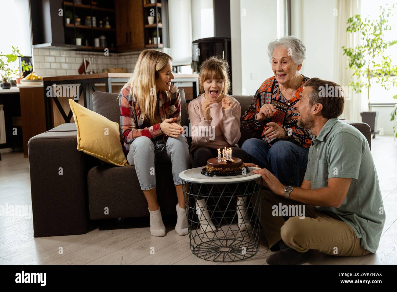 Heartwarming scene unfolds as a multi-generational family gathers on a ...