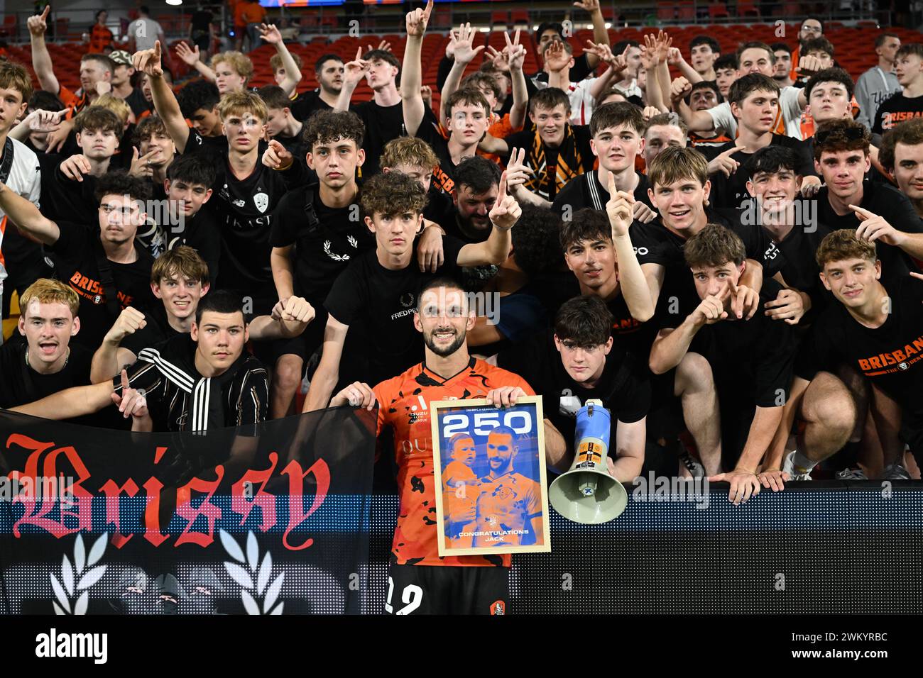 Jack Hingert (centre) of the Roar celebrates playing his 250th game ...