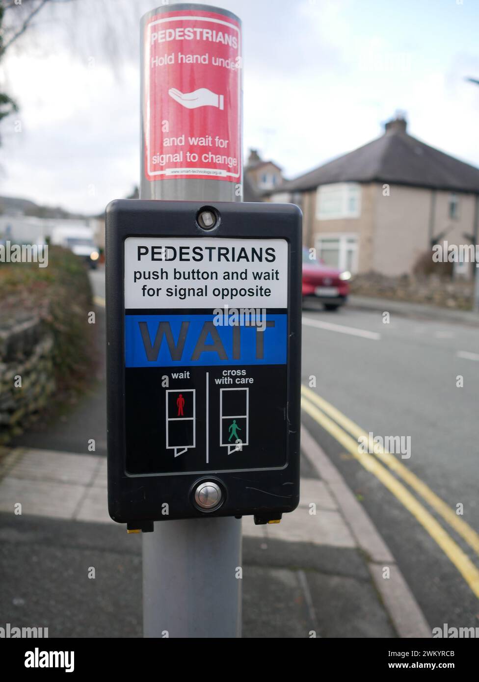 British pelican pedestrian crossing box attached to a post showing ...
