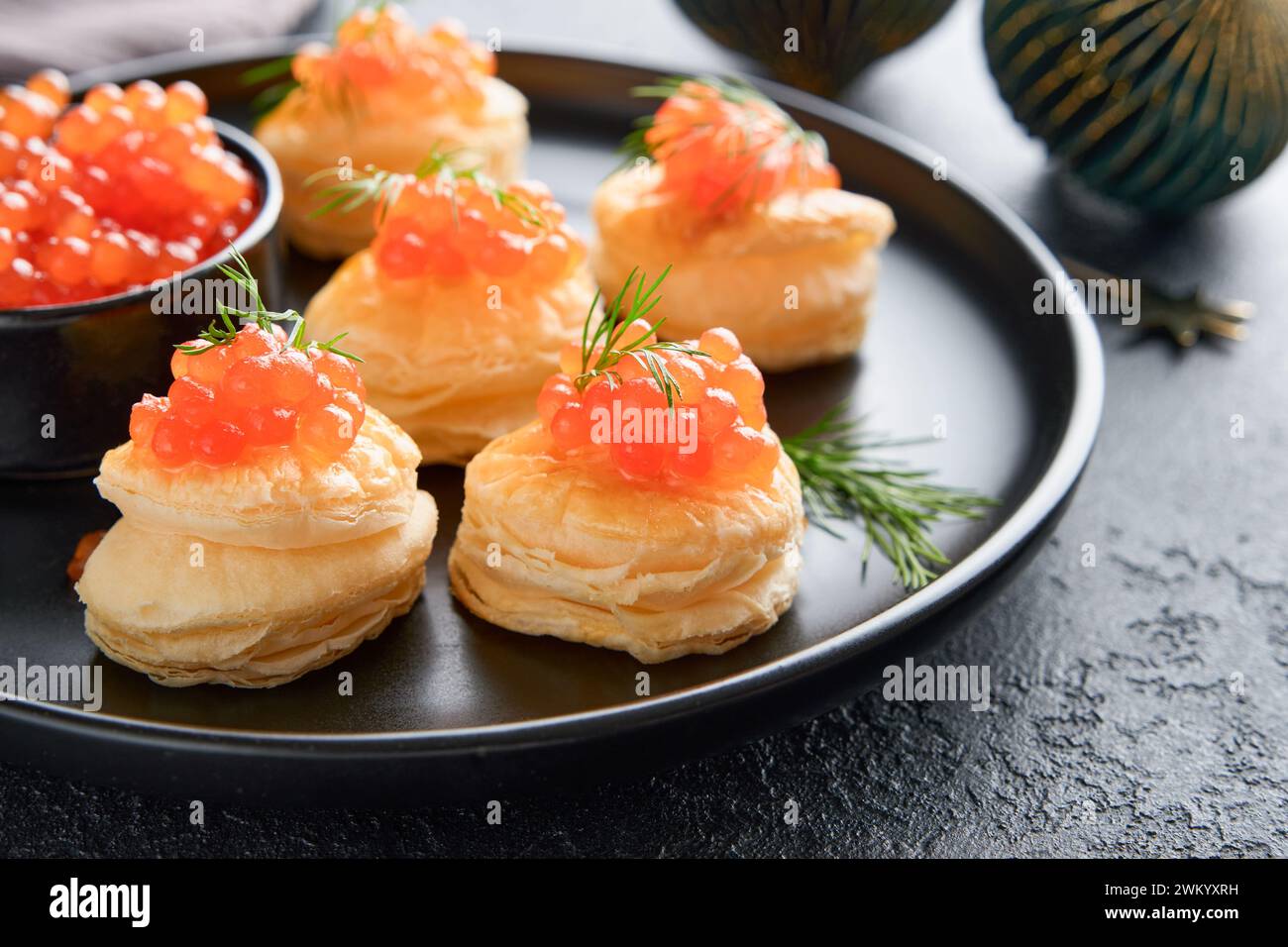 Salmon red caviar toast. Christmas canape or toast with red caviar on ...