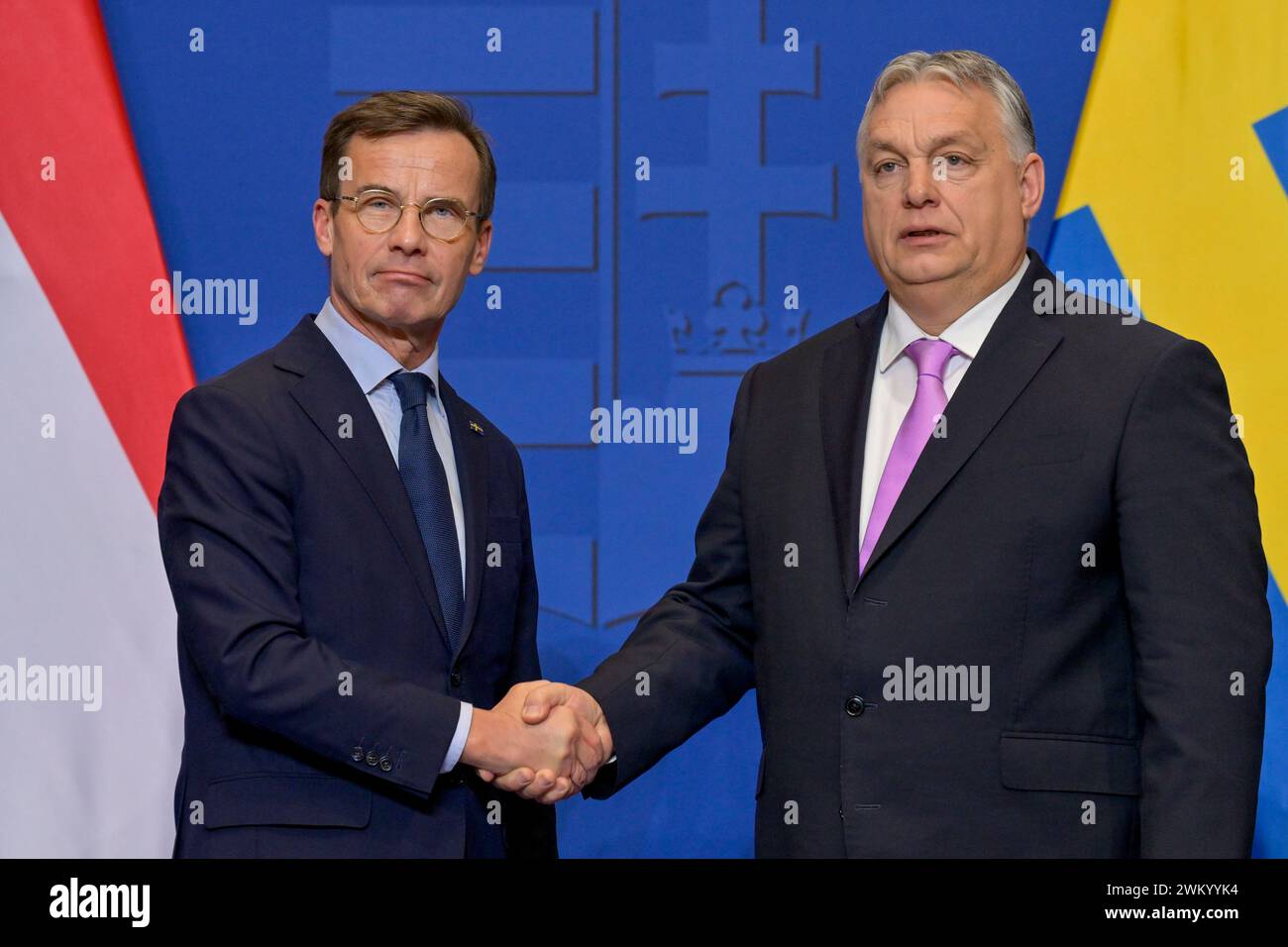 Sweden's Prime Minister Ulf Kristersson, left, shakes hands with his Hungarian counterpart ...