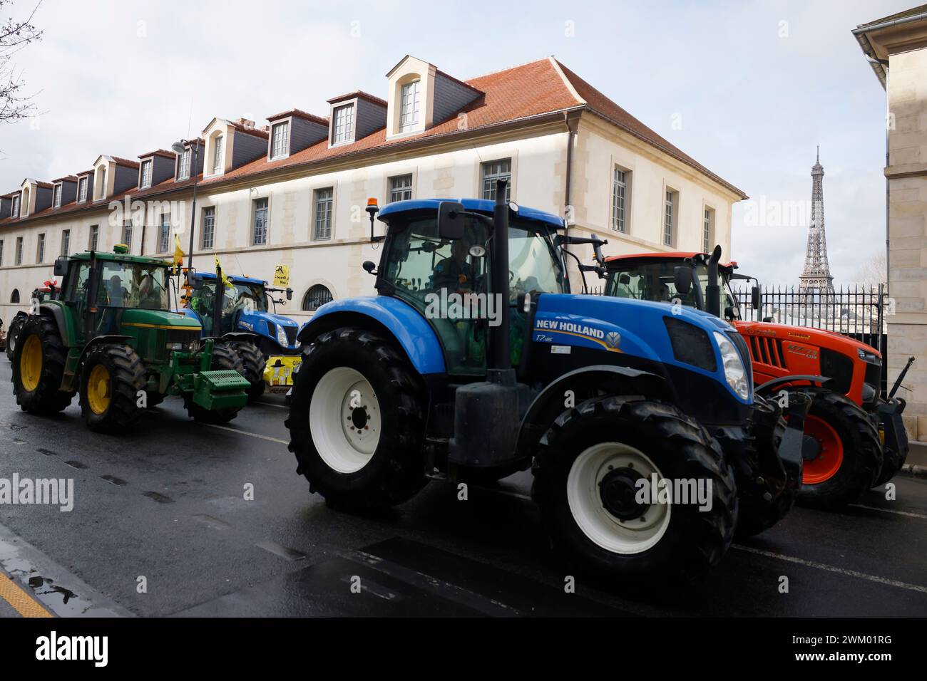 Farmers drive their tractors, Friday, Feb. 23, 2024 in Paris. Angry ...