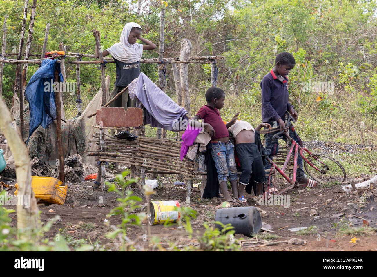 Children living in poverty amid garbage in a Zanzibar forest Stock ...