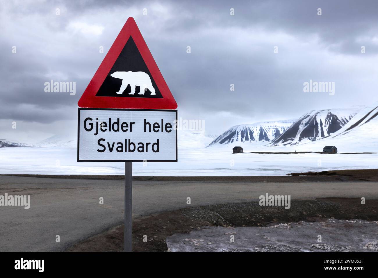 Polar bear danger sign for . Landscape of Svalbard in Norway, also ...