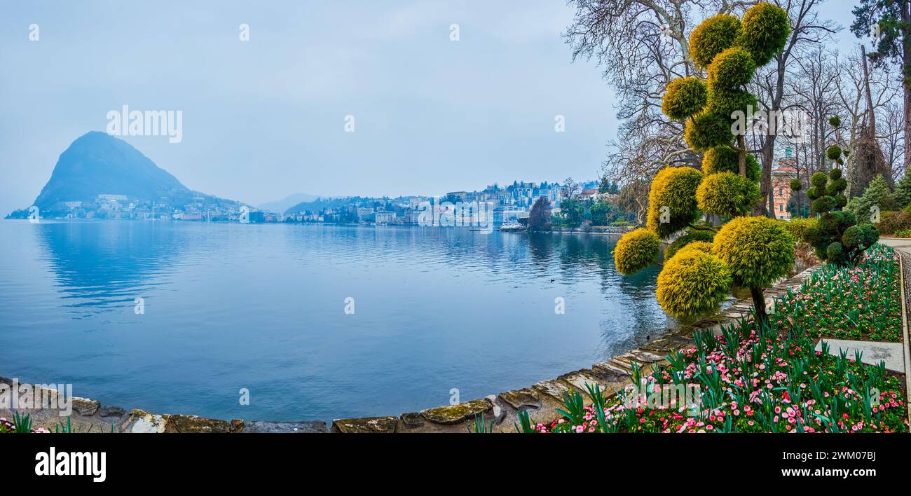 Panorama of lakeside Parco Ciani with scenic colorful flowerbed, Lugano ...