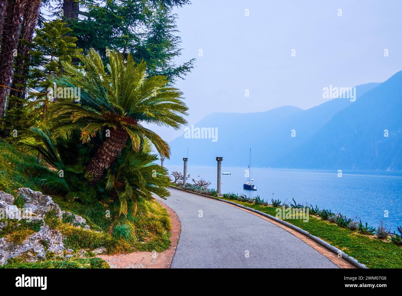 The lakeside path in Park Villa Heleneum on Lake Lugano, Lugano ...