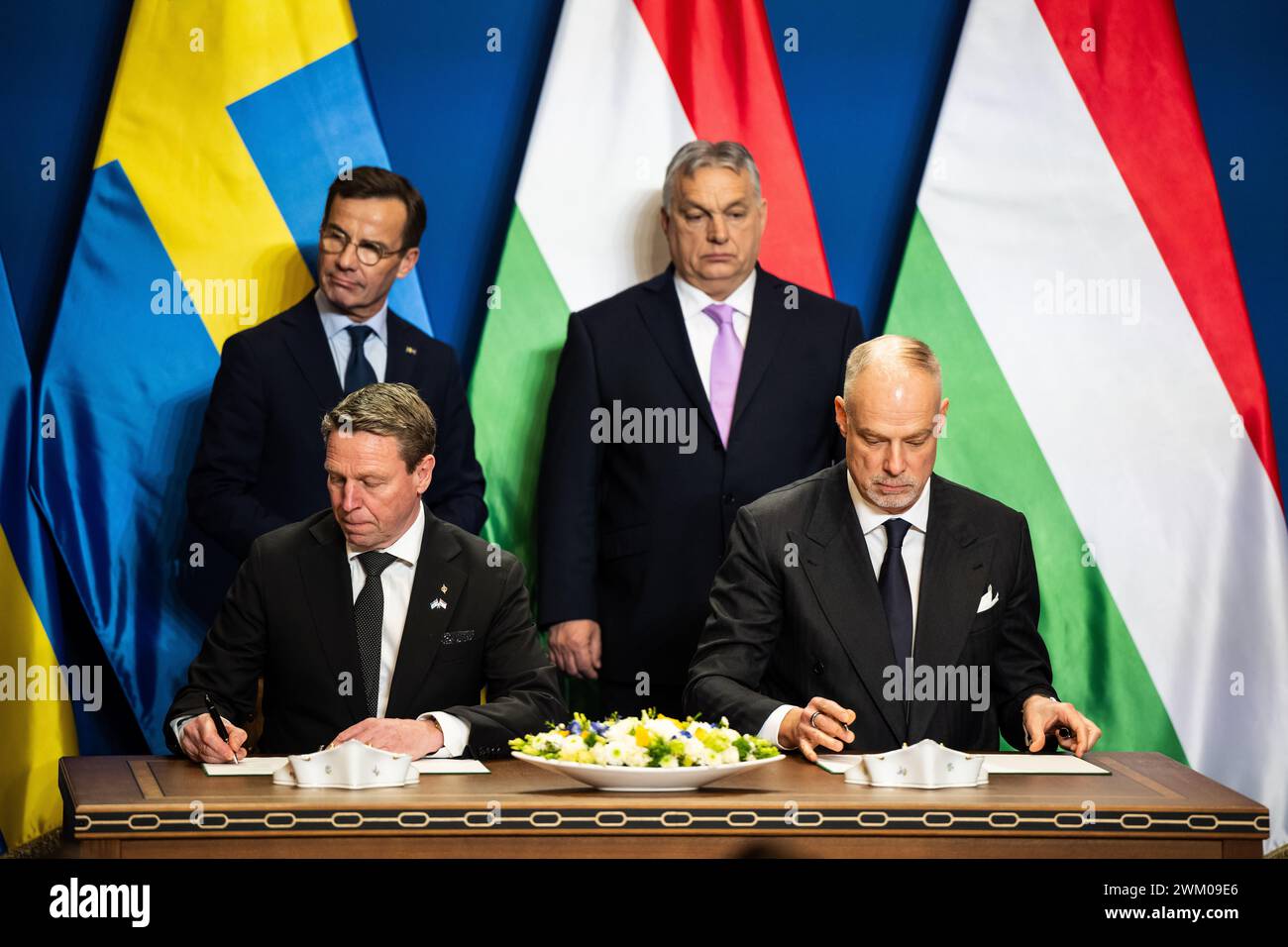 Budapest, Hungary. 23rd Feb, 2024. Göran Martensson (l), Director General of the Swedish Defense ...
