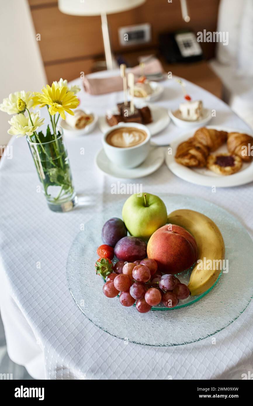 Hotel room service with fresh cappuccino and a variety of breakfast ...