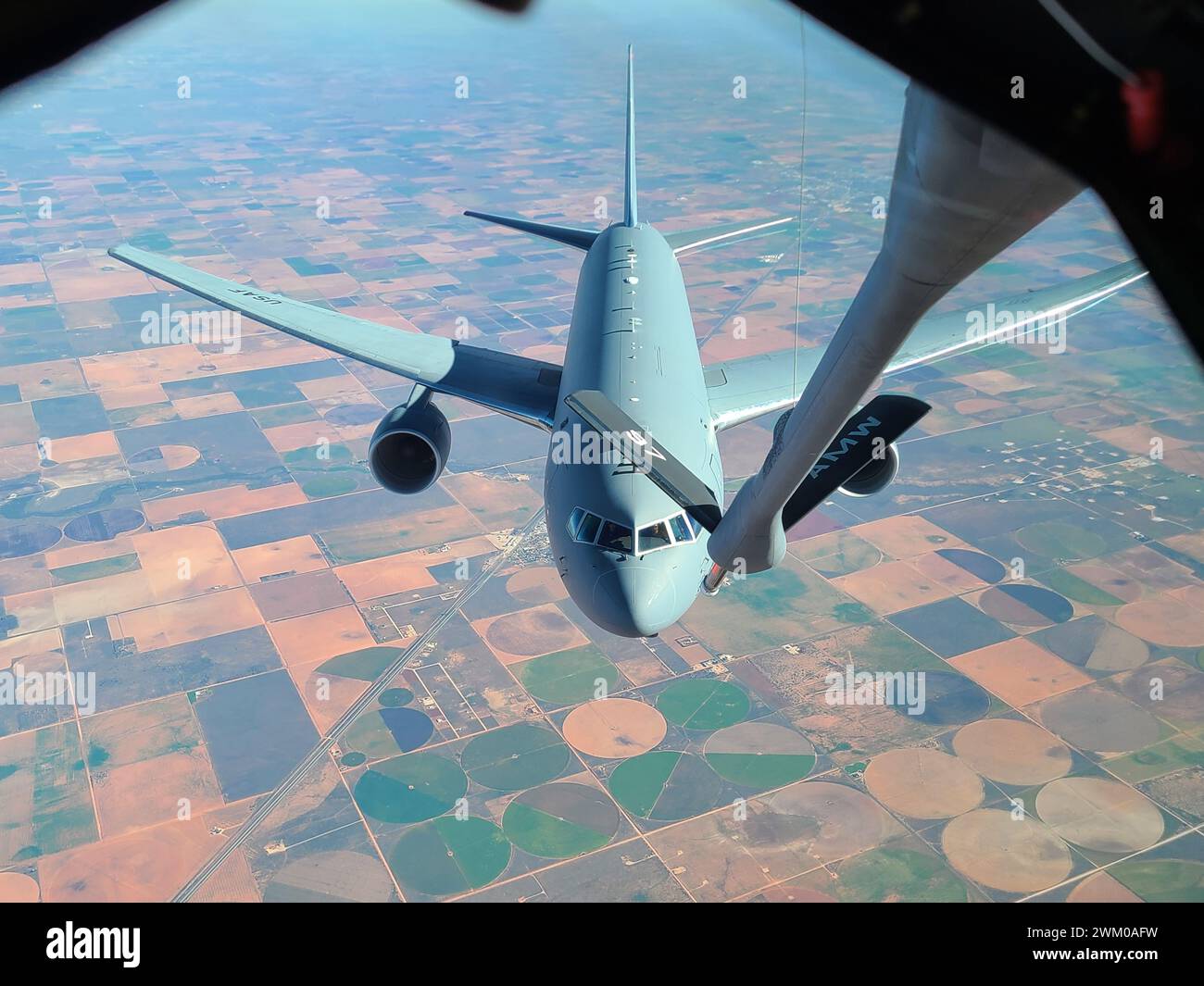 A KC-46 Pegasus is refueled by a KC-135 Stratotanker from Altus Air ...