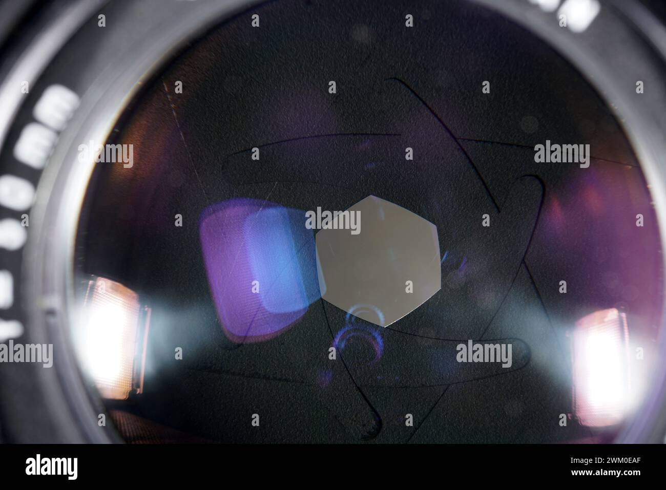 Lens with open aperture in detail Stock Photo - Alamy